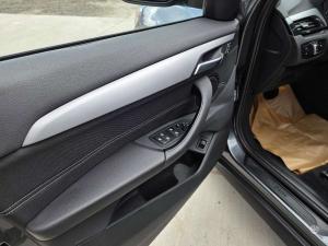 Grey BMW X1 2018 in Utena, with an engine capacity of 2.00 L and mileage of 271 thousand km for 12490 €, photo 11 on AUTOMOTO.COM.LV