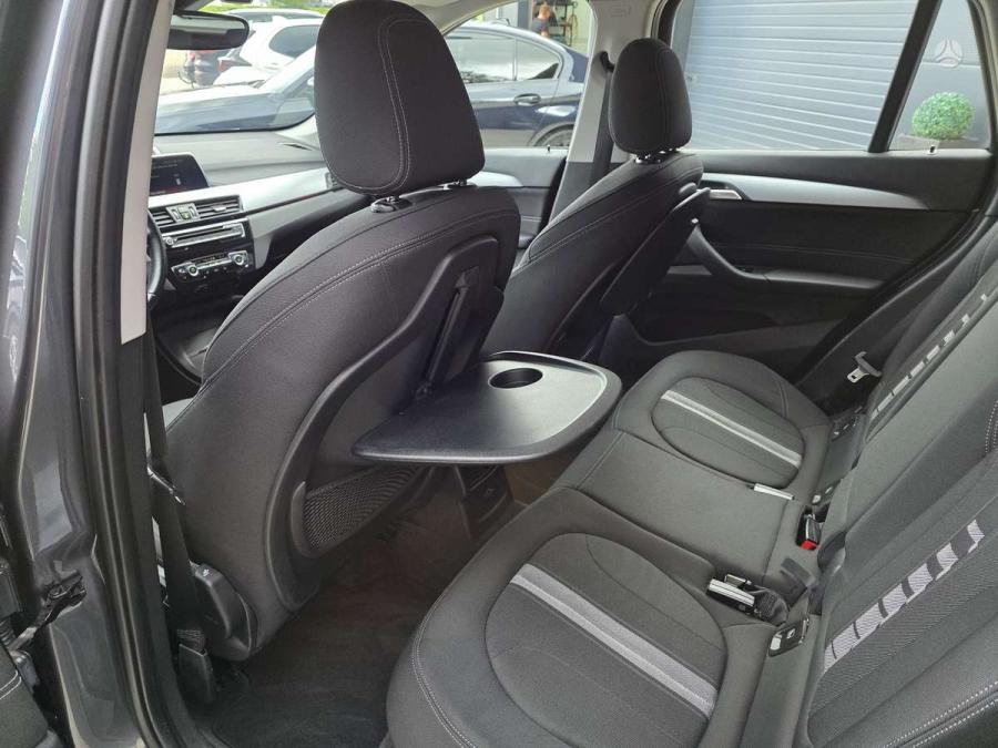 Grey BMW X1 2018 in Utena, with an engine capacity of 2.00 L and mileage of 271 thousand km for 12490 €, photo 18 on AUTOMOTO.COM.LV