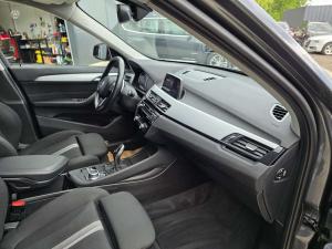 Grey BMW X1 2018 in Utena, with an engine capacity of 2.00 L and mileage of 271 thousand km for 12490 €, photo 19 on AUTOMOTO.COM.LV