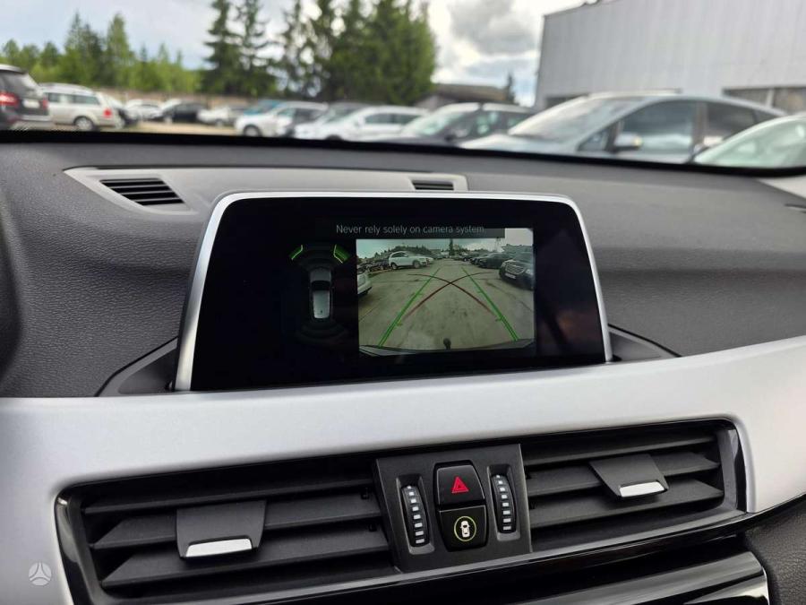 Grey BMW X1 2018 in Utena, with an engine capacity of 2.00 L and mileage of 271 thousand km for 12490 €, photo 23 on AUTOMOTO.COM.LV
