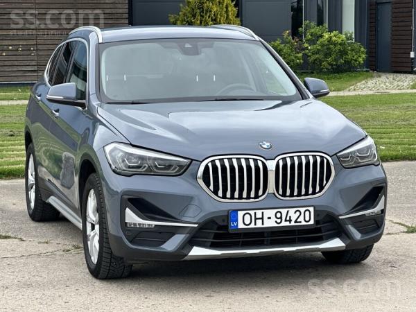 Grey BMW X1 2021 in Riga, with an engine capacity of 2.00 L and mileage of 279 thousand km for 16399 €, photo 1 on AUTOMOTO.COM.LV