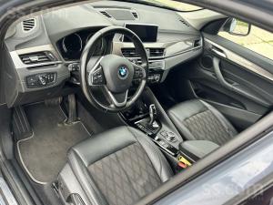 Grey BMW X1 2021 in Riga, with an engine capacity of 2.00 L and mileage of 279 thousand km for 16399 €, photo 22 on AUTOMOTO.COM.LV