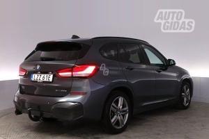 Grey BMW X1 2022 in Kaunas, with an engine capacity of 0.00 L and mileage of 59 thousand km for 34672 €, photo 5 on AUTOMOTO.COM.LV