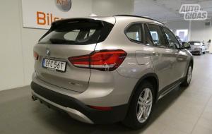Grey BMW X1 2022 in Kaunas, with an engine capacity of 0.00 L and mileage of 59 thousand km for 31272 €, photo 6 on AUTOMOTO.COM.LV