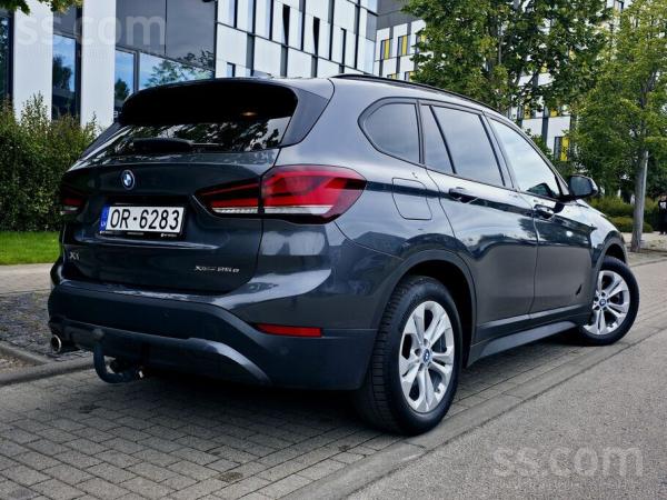 Grey BMW X1 2022 in Riga, with an engine capacity of 1.50 L and mileage of 129 thousand km for 18490 €, photo 7 on AUTOMOTO.COM.LV