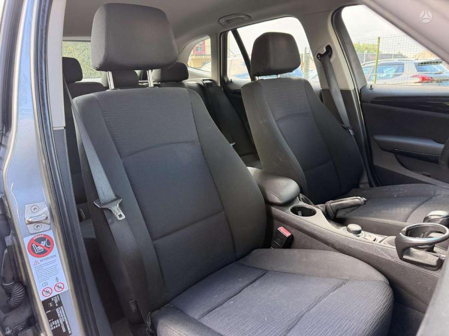 Grey BMW X1 2011 in Taurage, with an engine capacity of 2.00 L and mileage of 287 thousand km for 5150 €, photo 14 on AUTOMOTO.COM.LV