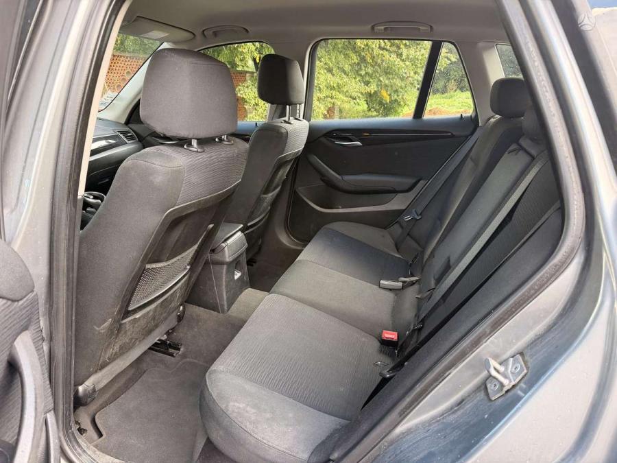 Grey BMW X1 2011 in Taurage, with an engine capacity of 2.00 L and mileage of 287 thousand km for 5150 €, photo 16 on AUTOMOTO.COM.LV