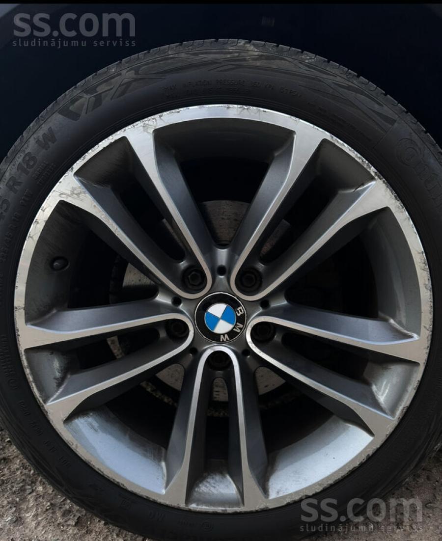 Grey BMW X1 2012 in Liepaja, with an engine capacity of 2.00 L and mileage of 293 thousand km for 7500 €, photo 9 on AUTOMOTO.COM.LV