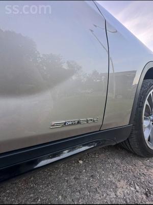 Grey BMW X1 2012 in Liepaja, with an engine capacity of 2.00 L and mileage of 293 thousand km for 7200 €, photo 6 on AUTOMOTO.COM.LV