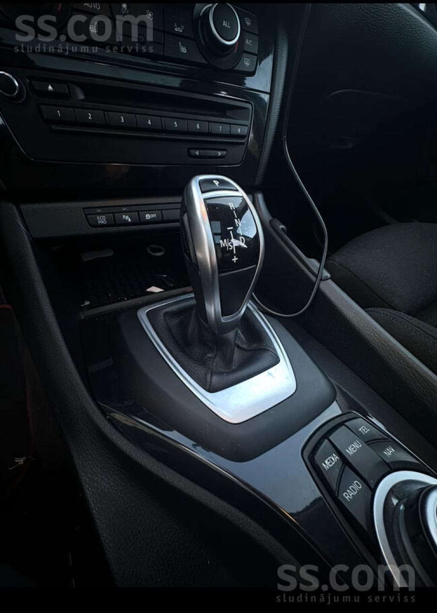Grey BMW X1 2012 in Liepaja, with an engine capacity of 2.00 L and mileage of 293 thousand km for 7200 €, photo 7 on AUTOMOTO.COM.LV