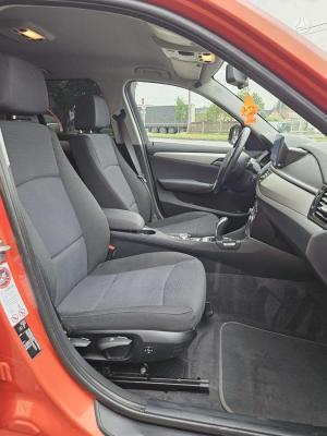 Orange BMW X1 2012 in Siauliai, with an engine capacity of 2.00 L and mileage of 282 thousand km for 8750 €, photo 15 on AUTOMOTO.COM.LV