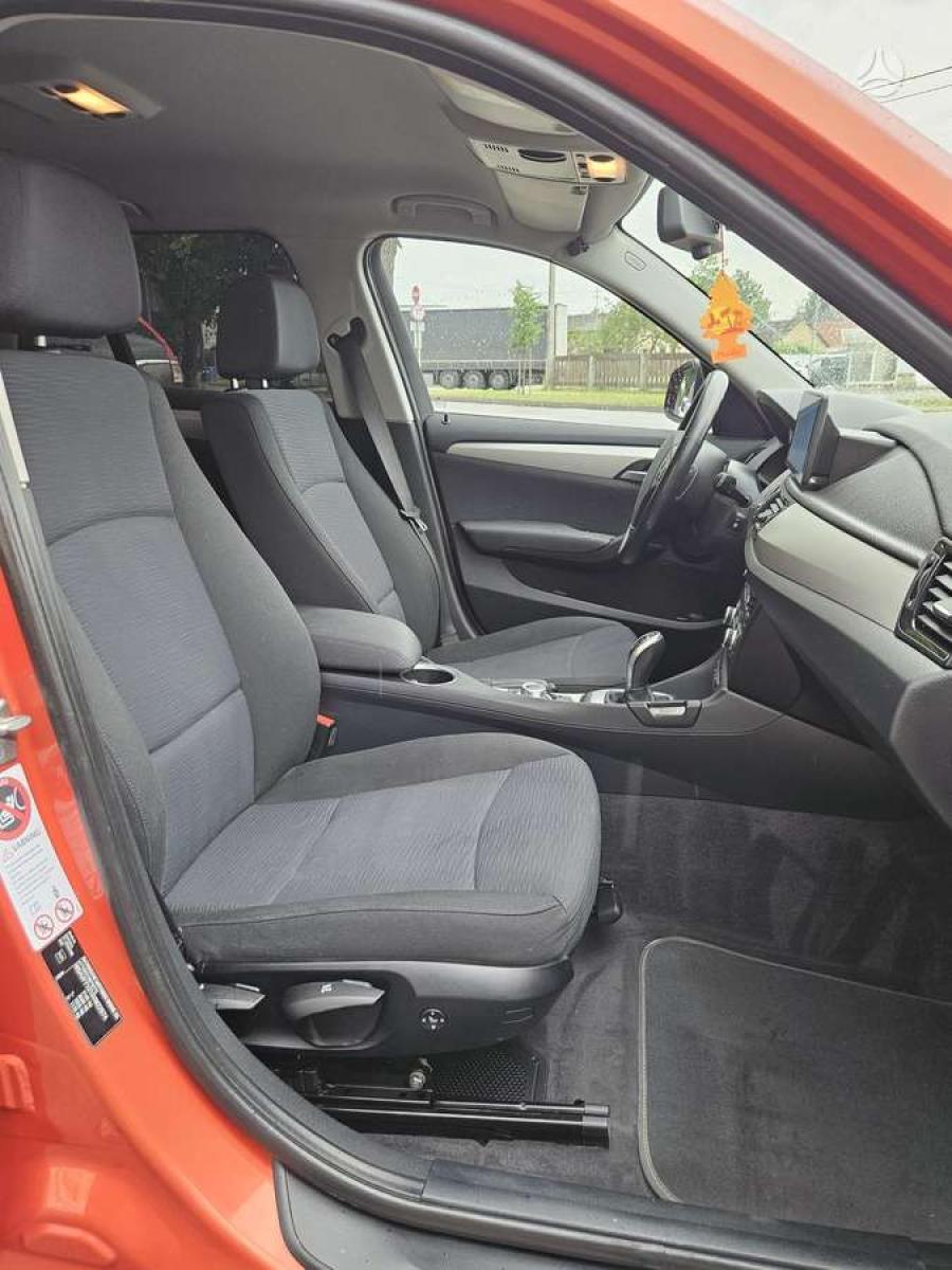 Orange BMW X1 2012 in Siauliai, with an engine capacity of 2.00 L and mileage of 282 thousand km for 8750 €, photo 15 on AUTOMOTO.COM.LV