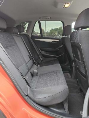 Orange BMW X1 2012 in Siauliai, with an engine capacity of 2.00 L and mileage of 282 thousand km for 8750 €, photo 16 on AUTOMOTO.COM.LV