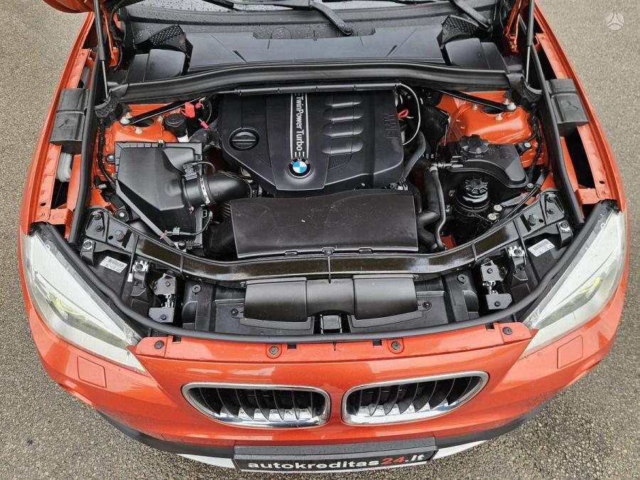 Orange BMW X1 2012 in Siauliai, with an engine capacity of 2.00 L and mileage of 282 thousand km for 8750 €, photo 25 on AUTOMOTO.COM.LV