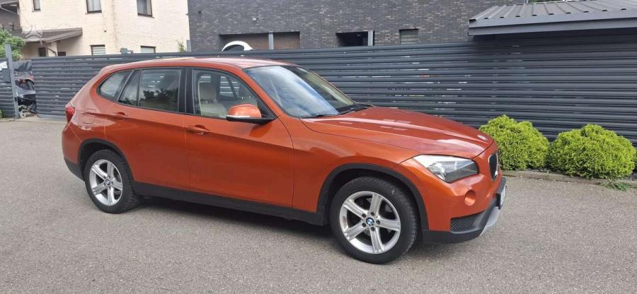 Orange BMW X1 2012 in Vilnius, with an engine capacity of 2.00 L and mileage of 163 thousand km for 5900 €, photo 5 on AUTOMOTO.COM.LV
