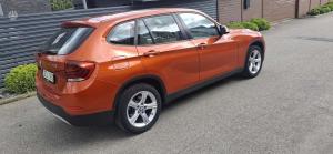 Orange BMW X1 2012 in Vilnius, with an engine capacity of 2.00 L and mileage of 163 thousand km for 5900 €, photo 6 on AUTOMOTO.COM.LV