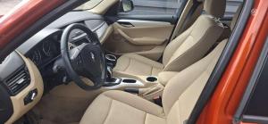Orange BMW X1 2012 in Vilnius, with an engine capacity of 2.00 L and mileage of 163 thousand km for 5900 €, photo 11 on AUTOMOTO.COM.LV