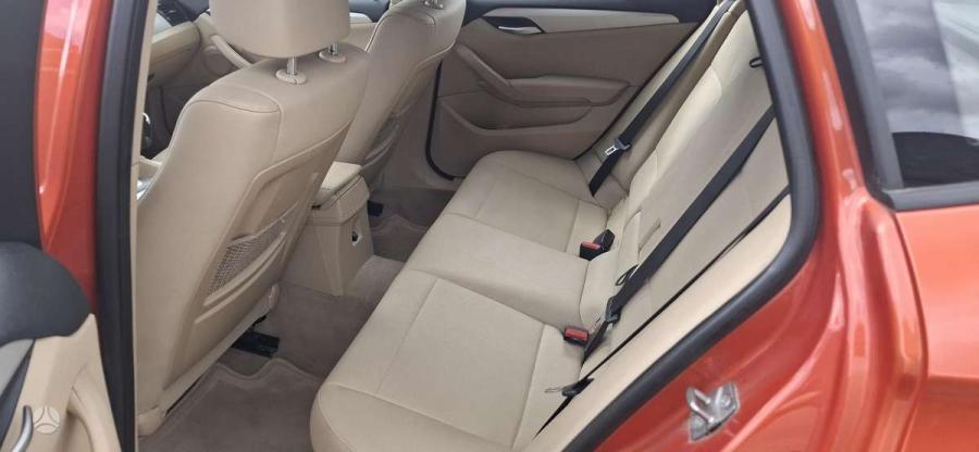 Orange BMW X1 2012 in Vilnius, with an engine capacity of 2.00 L and mileage of 163 thousand km for 5900 €, photo 12 on AUTOMOTO.COM.LV
