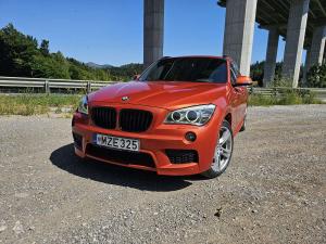 Orange BMW X1 2014 in Marijampole, with an engine capacity of 2.00 L and mileage of 215 thousand km for 10700 €, photo 4 on AUTOMOTO.COM.LV