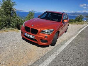 Orange BMW X1 2014 in Marijampole, with an engine capacity of 2.00 L and mileage of 215 thousand km for 10700 €, photo 8 on AUTOMOTO.COM.LV