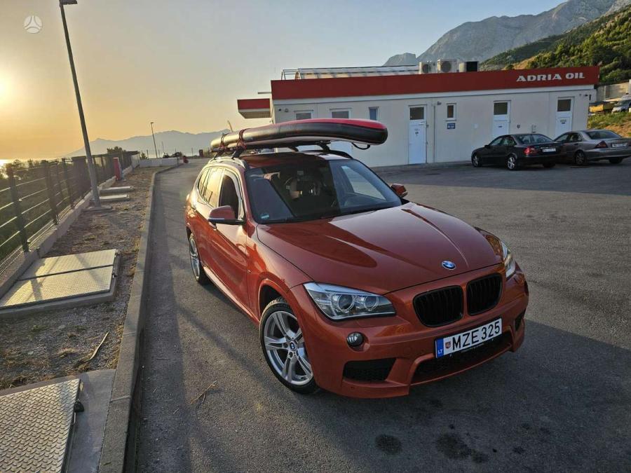Orange BMW X1 2014 in Marijampole, with an engine capacity of 2.00 L and mileage of 215 thousand km for 10700 €, photo 10 on AUTOMOTO.COM.LV
