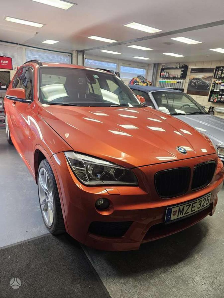Orange BMW X1 2014 in Marijampole, with an engine capacity of 2.00 L and mileage of 215 thousand km for 10700 €, photo 12 on AUTOMOTO.COM.LV