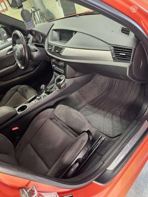 Orange BMW X1 2014 in Marijampole, with an engine capacity of 2.00 L and mileage of 215 thousand km for 10700 €, photo 23 on AUTOMOTO.COM.LV