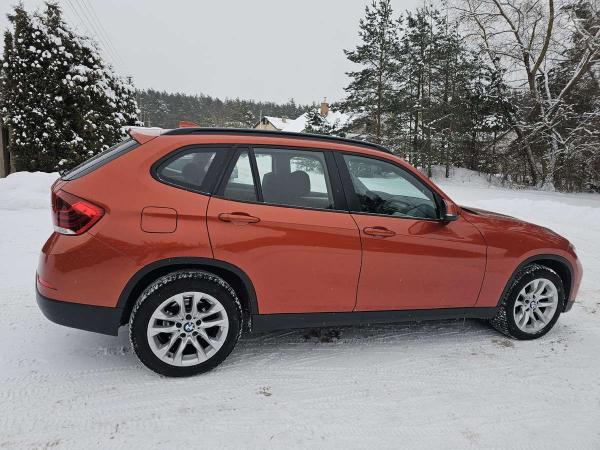 Orange BMW X1 2014 in Ukmerge, with an engine capacity of 2.00 L and mileage of 237 thousand km for 6999 €, photo 3 on AUTOMOTO.COM.LV