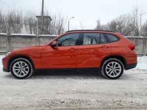 Orange BMW X1 2014 in Riga, with an engine capacity of 2.00 L and mileage of 237 thousand km for 9300 €, photo  on AUTOMOTO.COM.LV