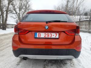 Orange BMW X1 2014 in Riga, with an engine capacity of 2.00 L and mileage of 237 thousand km for 9300 €, photo 5 on AUTOMOTO.COM.LV