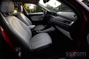 Orange BMW X1 2018 in Riga, with an engine capacity of 2.50 L and mileage of 0 thousand km for 17900 €, photo 8 on AUTOMOTO.COM.LV