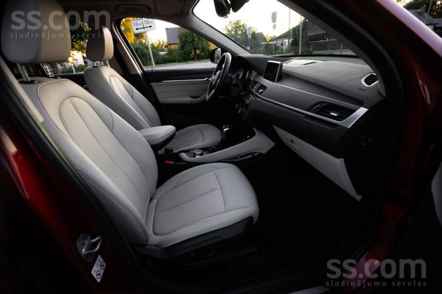 Orange BMW X1 2018 in Riga, with an engine capacity of 2.50 L and mileage of 0 thousand km for 17900 €, photo 8 on AUTOMOTO.COM.LV