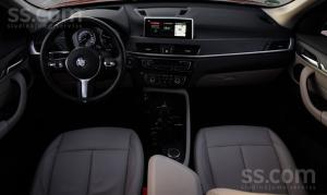 Orange BMW X1 2018 in Riga, with an engine capacity of 2.50 L and mileage of 0 thousand km for 17900 €, photo 12 on AUTOMOTO.COM.LV