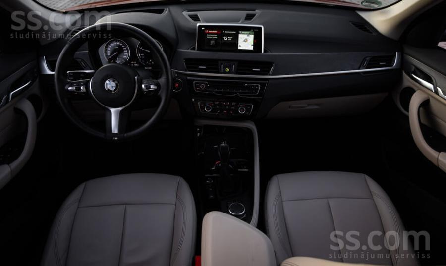 Orange BMW X1 2018 in Riga, with an engine capacity of 2.50 L and mileage of 0 thousand km for 17900 €, photo 12 on AUTOMOTO.COM.LV