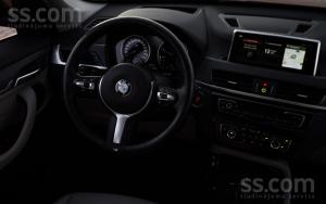 Orange BMW X1 2018 in Riga, with an engine capacity of 2.50 L and mileage of 0 thousand km for 17900 €, photo 13 on AUTOMOTO.COM.LV