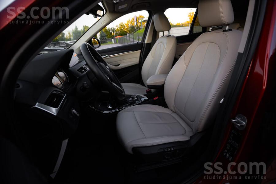 Orange BMW X1 2018 in Riga, with an engine capacity of 2.50 L and mileage of 0 thousand km for 17900 €, photo 14 on AUTOMOTO.COM.LV