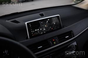 Orange BMW X1 2018 in Riga, with an engine capacity of 2.50 L and mileage of 0 thousand km for 17900 €, photo 21 on AUTOMOTO.COM.LV