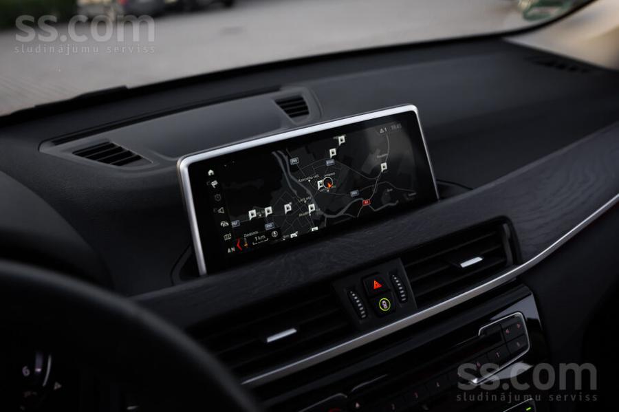Orange BMW X1 2018 in Riga, with an engine capacity of 2.50 L and mileage of 0 thousand km for 17900 €, photo 21 on AUTOMOTO.COM.LV
