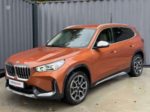 Orange BMW X1 2022 in Vilnius, with an engine capacity of 1.50 L and mileage of 62 thousand km for 26400 €, photo  on AUTOMOTO.COM.LV