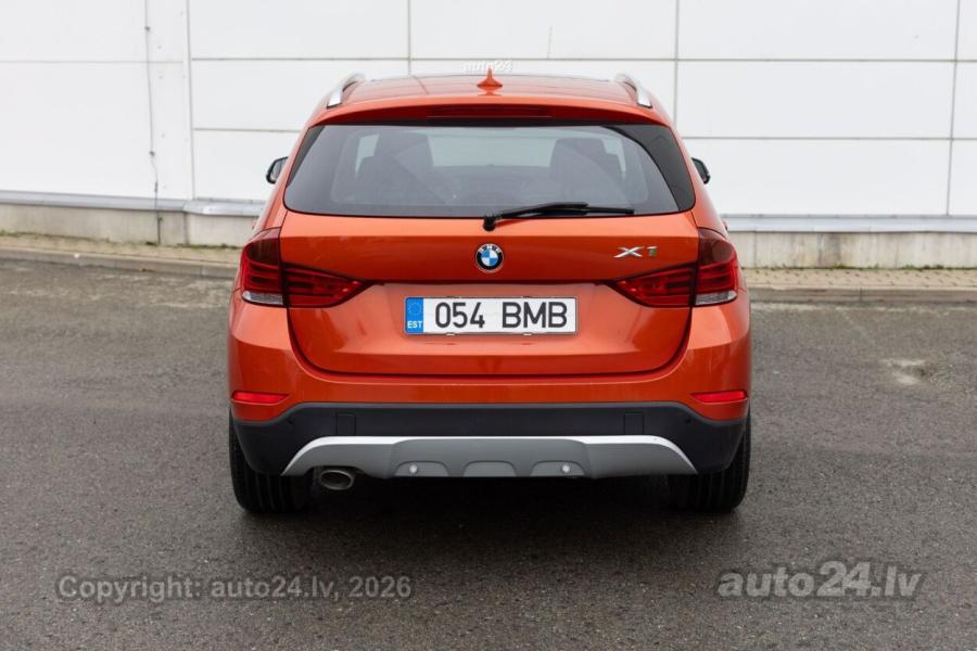 Oranžs BMW X1 2013 Tallina, ar dzinēja tilpumu 2.00 L un nobraukumu 124 tūkst. km par 12500 €, foto 7 vietnē AUTOMOTO.COM.LV