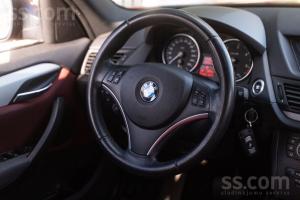 Red BMW X1 2010 in Liepaja, with an engine capacity of 2.00 L and mileage of 267 thousand km for 7500 €, photo 34 on AUTOMOTO.COM.LV