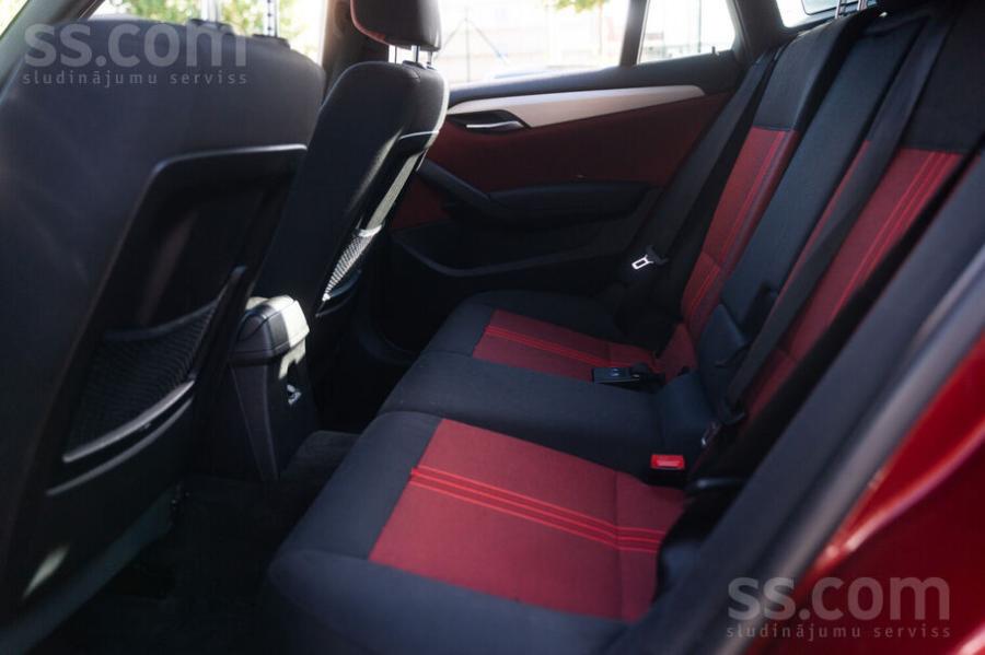 Red BMW X1 2010 in Liepaja, with an engine capacity of 2.00 L and mileage of 267 thousand km for 7500 €, photo 35 on AUTOMOTO.COM.LV