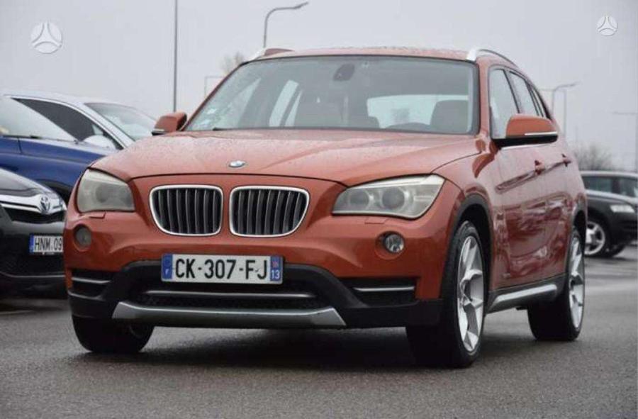 Red BMW X1 2012 in Taurage, with an engine capacity of 2.00 L and mileage of 231 thousand km for 6500 €, photo 1 on AUTOMOTO.COM.LV