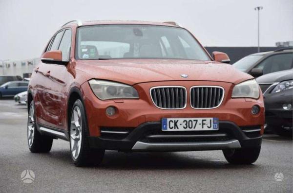 Red BMW X1 2012 in Taurage, with an engine capacity of 2.00 L and mileage of 231 thousand km for 6500 €, photo 3 on AUTOMOTO.COM.LV