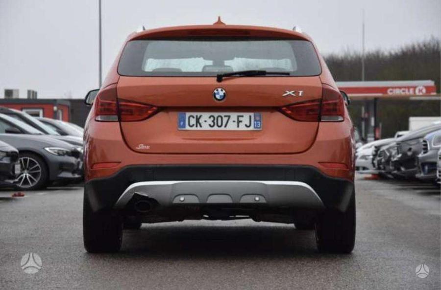Red BMW X1 2012 in Taurage, with an engine capacity of 2.00 L and mileage of 231 thousand km for 6700 €, photo 5 on AUTOMOTO.COM.LV