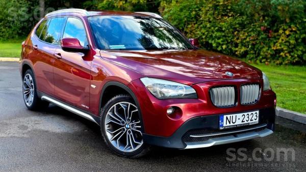 Red BMW X1 2011 in Riga, with an engine capacity of 2.00 L and mileage of 286 thousand km for 6500 €, photo 1 on AUTOMOTO.COM.LV
