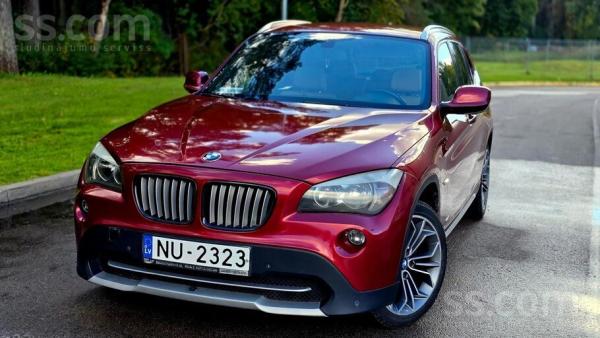 Red BMW X1 2011 in Riga, with an engine capacity of 2.00 L and mileage of 286 thousand km for 6500 €, photo 3 on AUTOMOTO.COM.LV