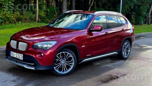 Red BMW X1 2011 in Riga, with an engine capacity of 2.00 L and mileage of 286 thousand km for 6500 €, photo 5 on AUTOMOTO.COM.LV