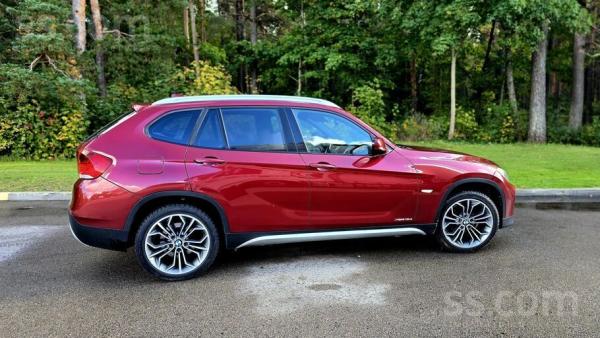 Red BMW X1 2011 in Riga, with an engine capacity of 2.00 L and mileage of 286 thousand km for 6500 €, photo 7 on AUTOMOTO.COM.LV