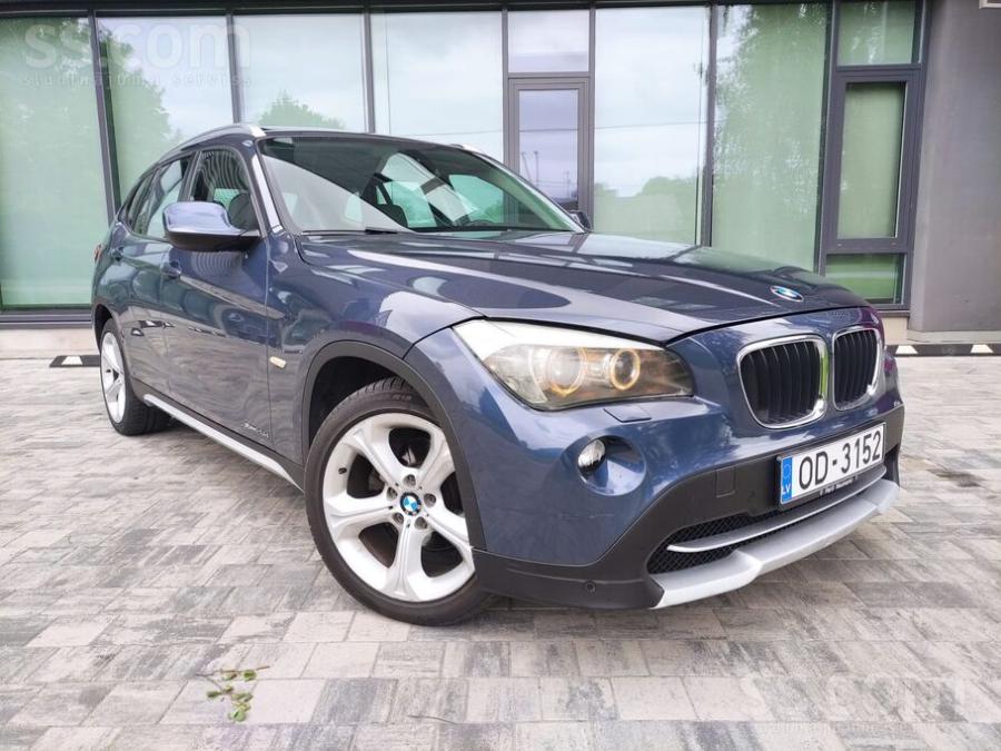 Violet BMW X1 2010 in Riga, with an engine capacity of 2.00 L and mileage of 283 thousand km for 7250 €, photo 1 on AUTOMOTO.COM.LV